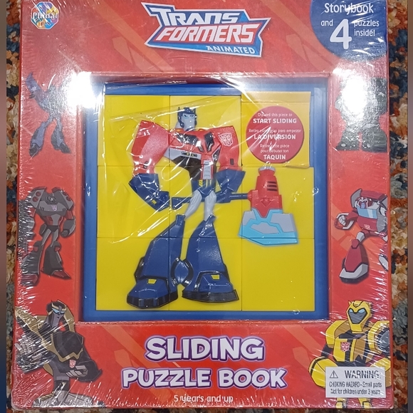 Hasbro | Toys | Transformers Animated Sliding Puzzle Book | Poshmark
